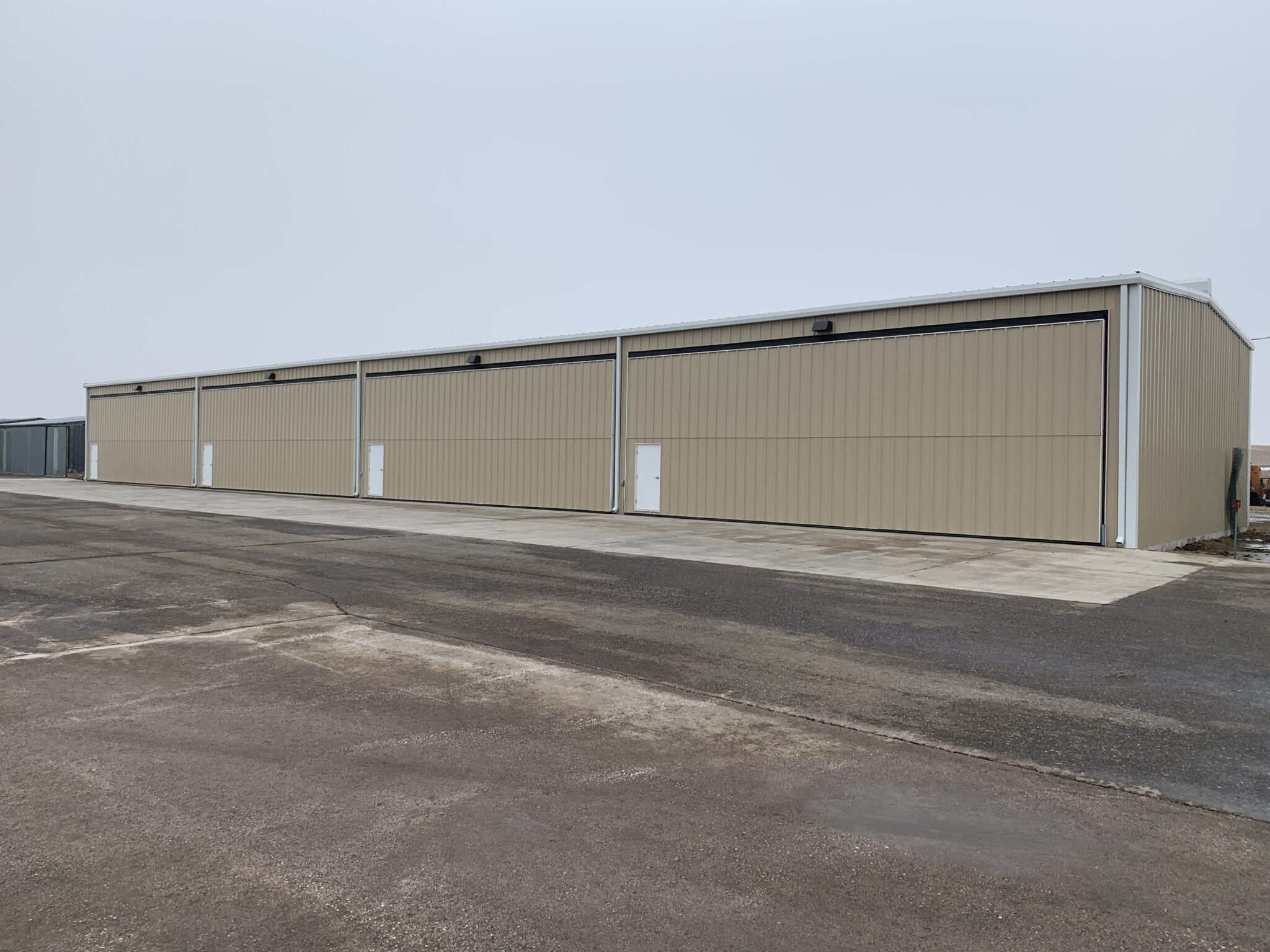 Multi Aircraft Hangar Bi-Fold Doors - Midland Door Solutions
